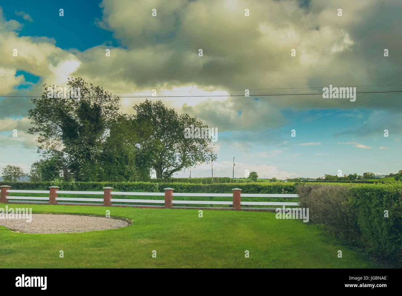 a bright sunny day at an Irish countryside Stock Photo - Alamy