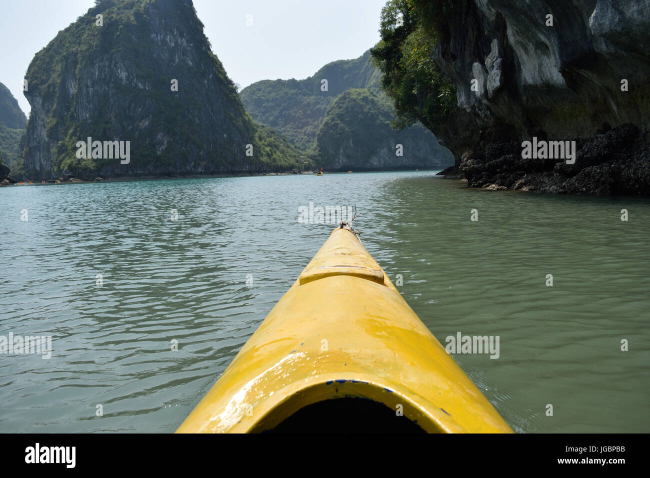 Kayaking in Ha long bay Stock Photo - Alamy