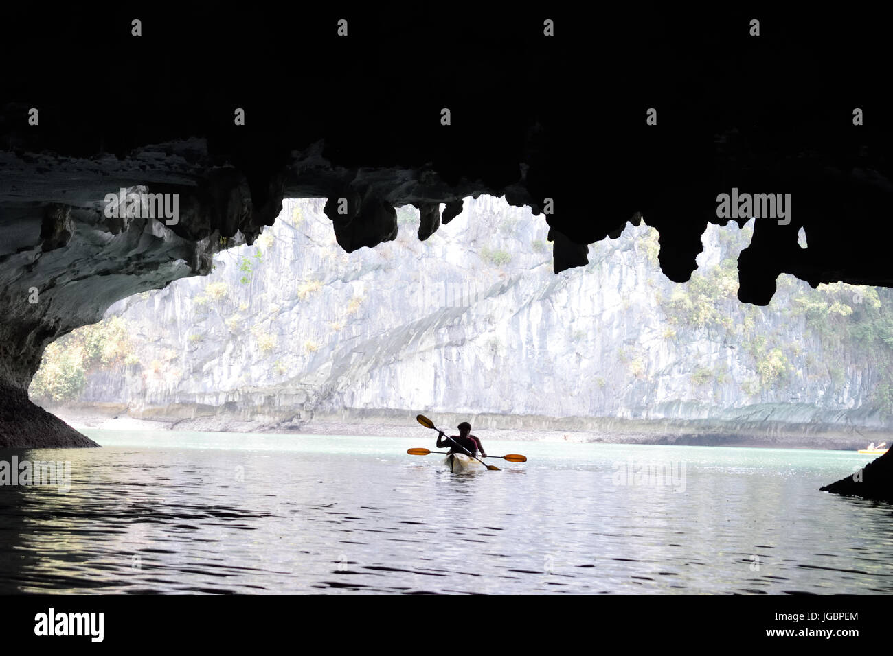 Kayaking in Ha long bay Stock Photo - Alamy