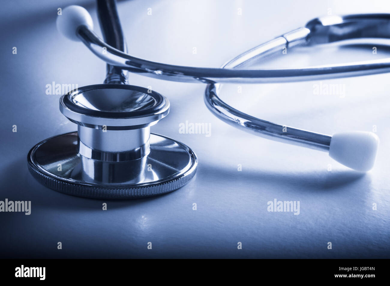 Close up of a Doctor's medical Stethoscope, laid face-down on a table ...