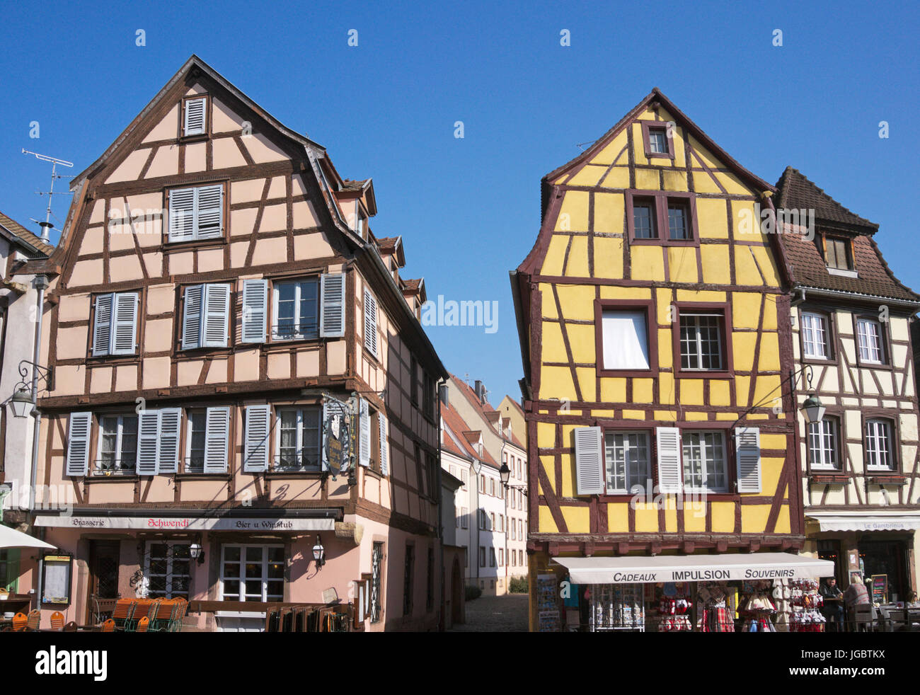 traditional colorful half-timbered houses in Colmar city, Alsace region ...