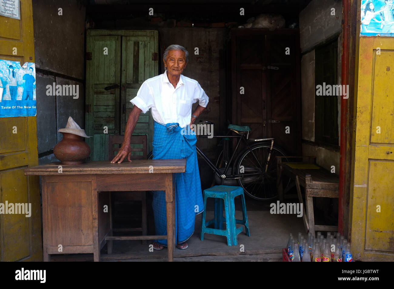 Male shop owner, Mandalay, Myanmar Stock Photo - Alamy