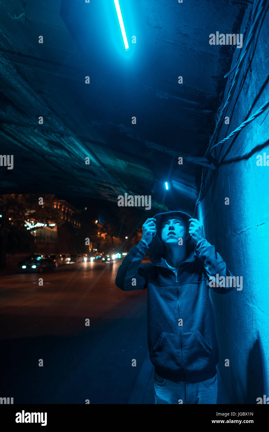 Man under the bridge Stock Photo - Alamy