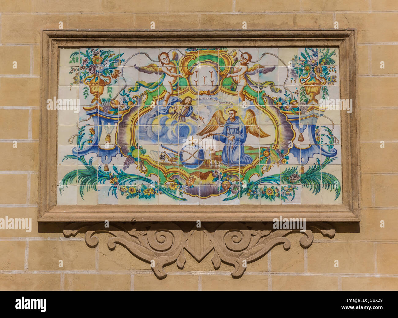 Religious scene in ceramic tiles in Valencia, Spain Stock Photo - Alamy