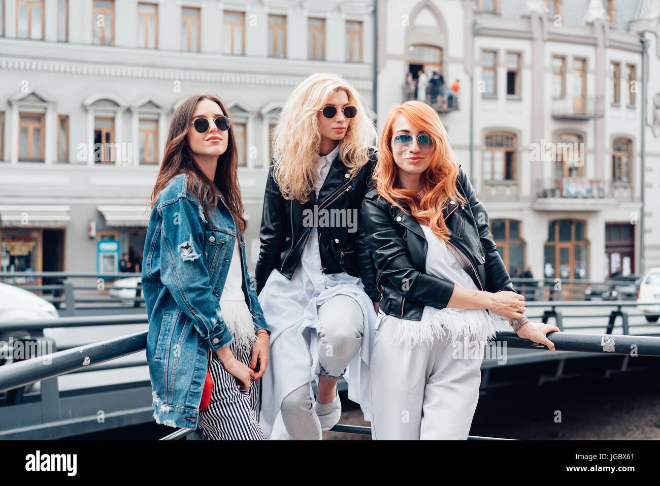 three beautiful girls on the street Stock Photo - Alamy