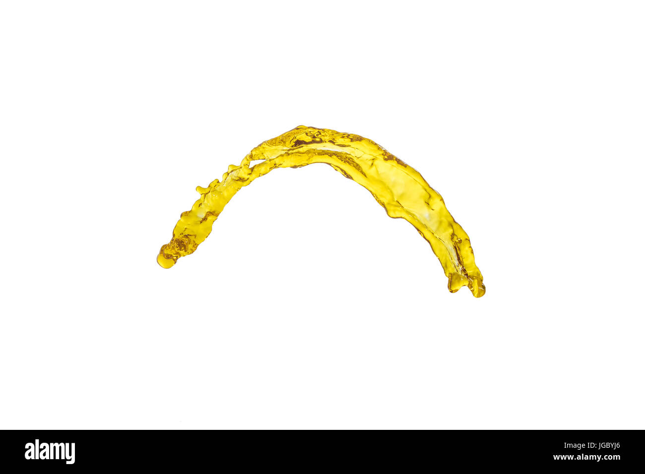 a splash of yellow liquid isolated on a white background Stock Photo ...