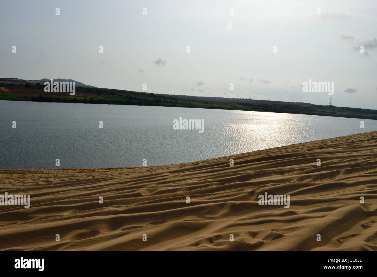 Sand and lake Stock Photo - Alamy