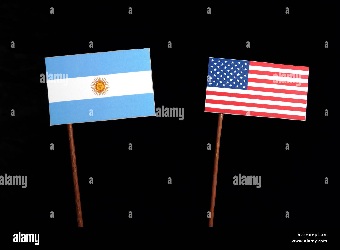 Argentinian flag with USA flag isolated on black background Stock Photo ...
