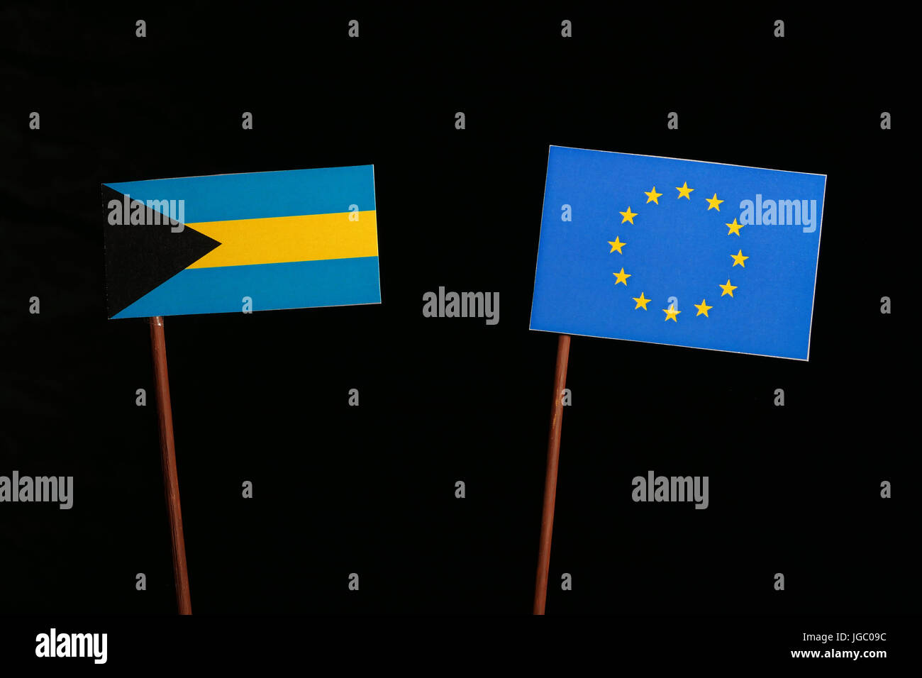 Bahamas flag with European Union (EU) flag isolated on black background ...