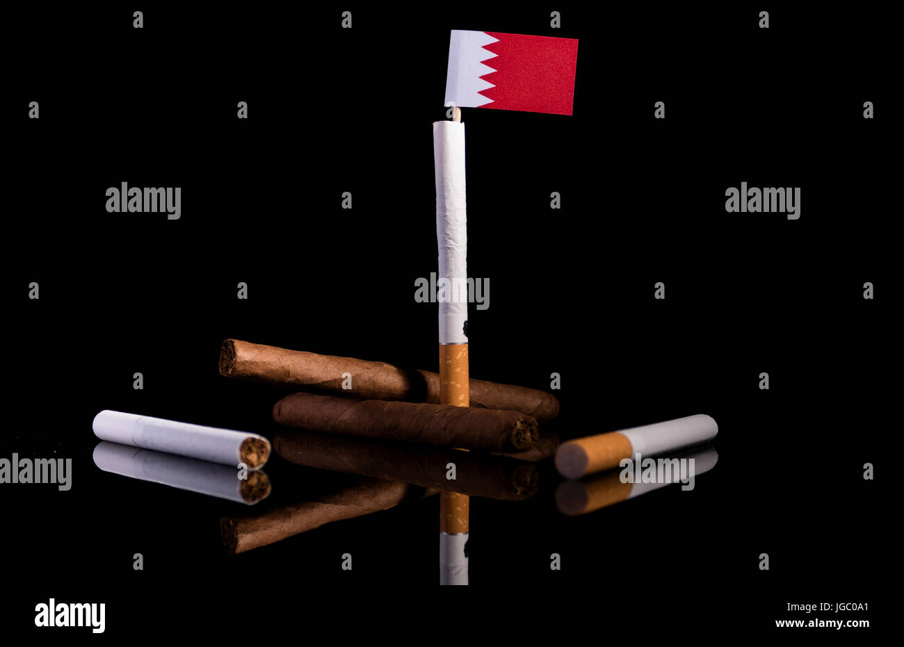 Bahrain flag with cigarettes and cigars. Tobacco Industry concept Stock ...