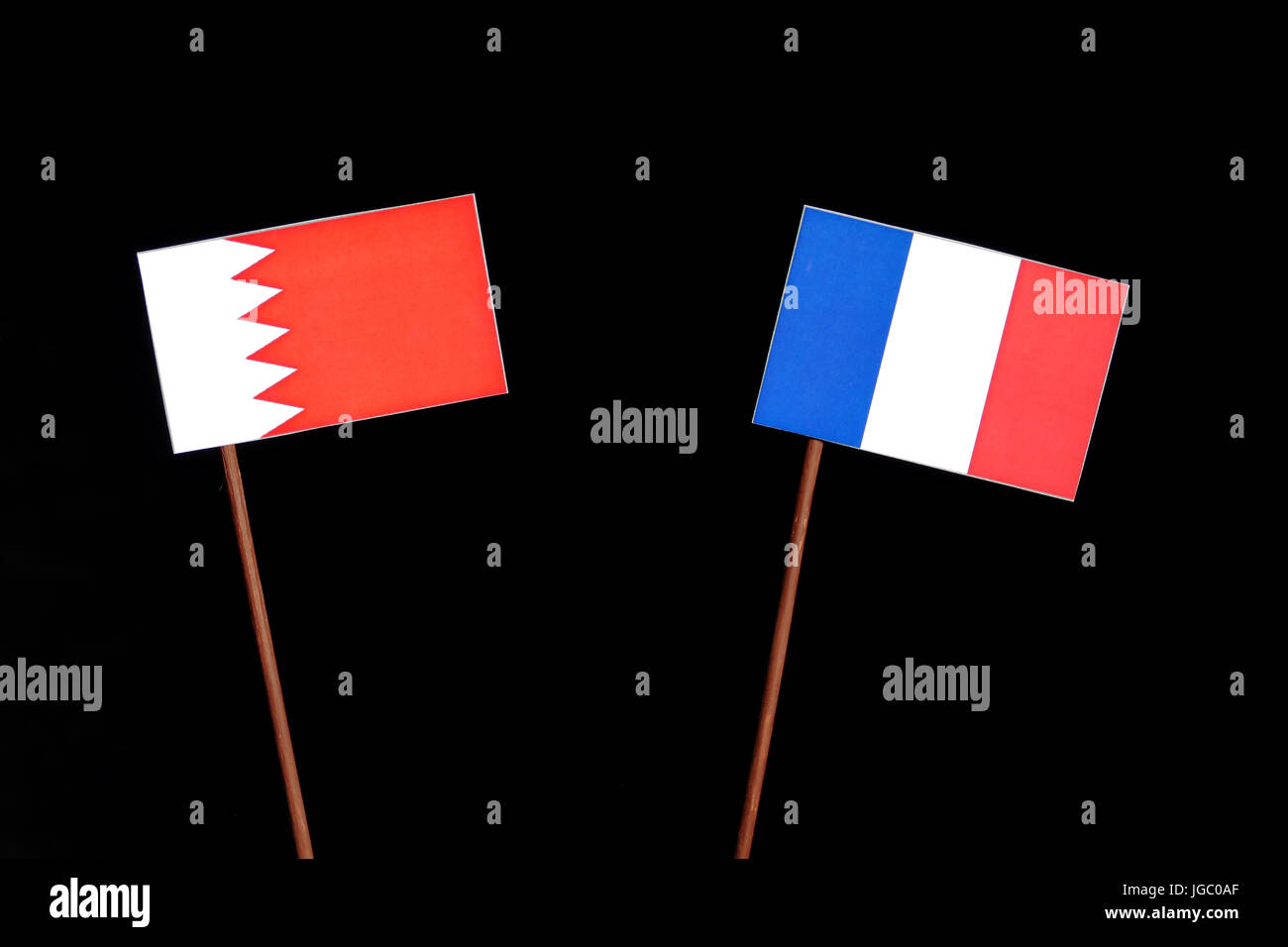 Bahrain flag with French flag isolated on black background Stock Photo ...
