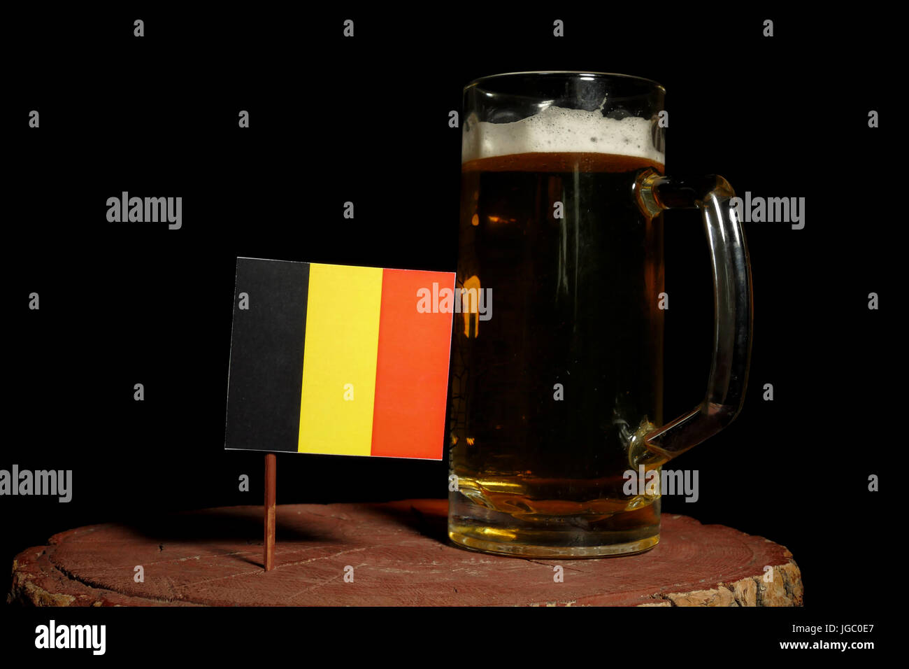 Belgian flag with beer mug isolated on black background Stock Photo - Alamy