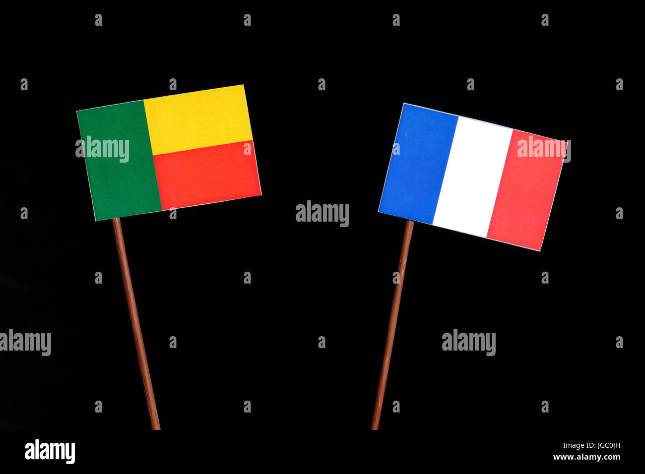 Benin flag with French flag isolated on black background Stock Photo ...