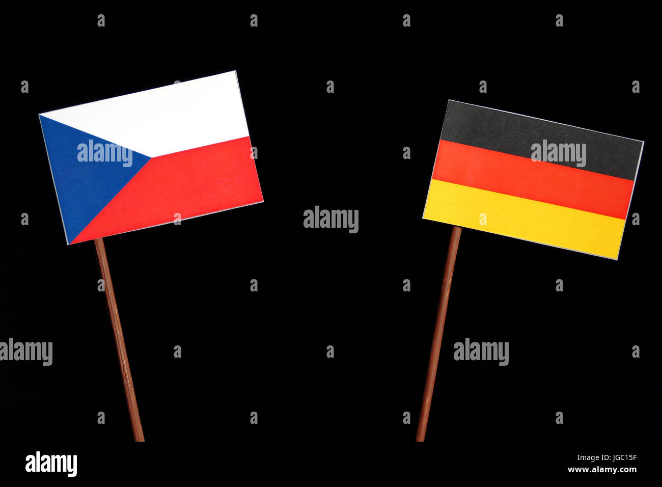 Czech flag with German flag isolated on black background Stock Photo ...