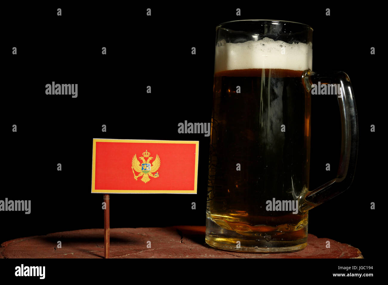 Montenegrin flag with beer mug isolated on black background Stock Photo ...