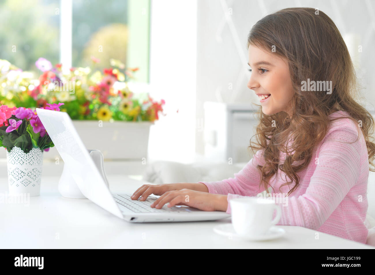 girl using modern laptop Stock Photo - Alamy