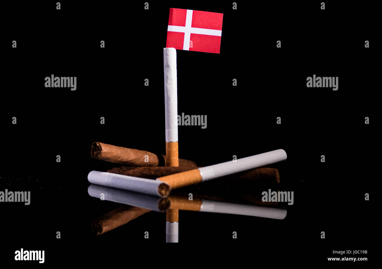 Danish flag with cigarettes and cigars. Tobacco Industry concept Stock ...