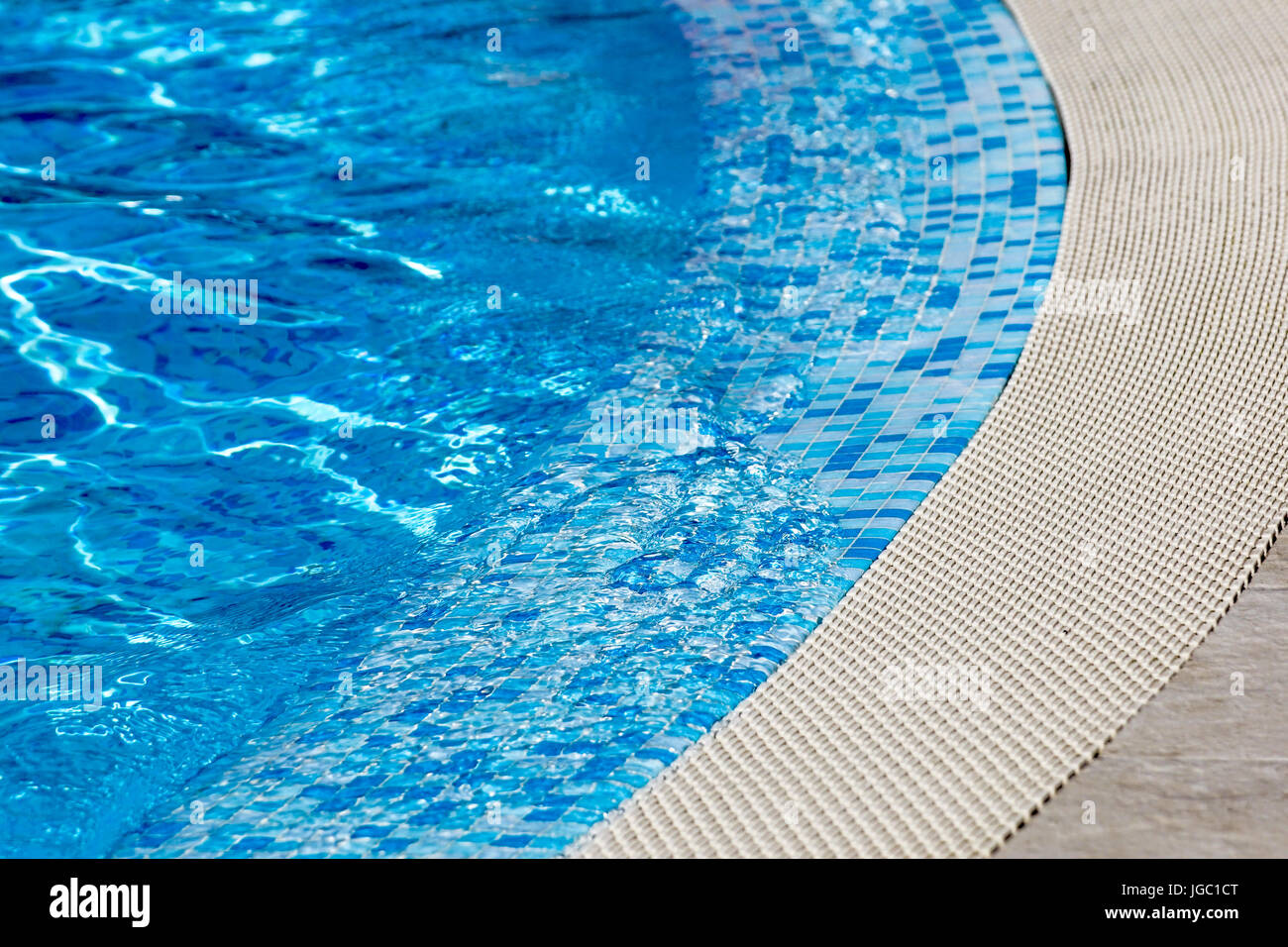 Detail of Swimming Pool - Clear Blue Water Stock Photo - Alamy