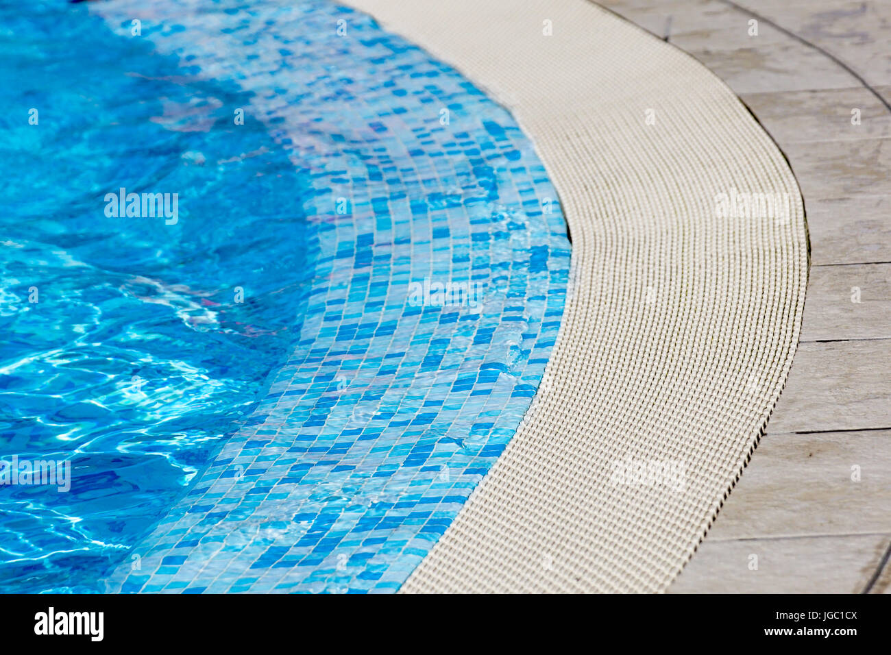 Detail of Swimming Pool - Clear Blue Water Stock Photo - Alamy