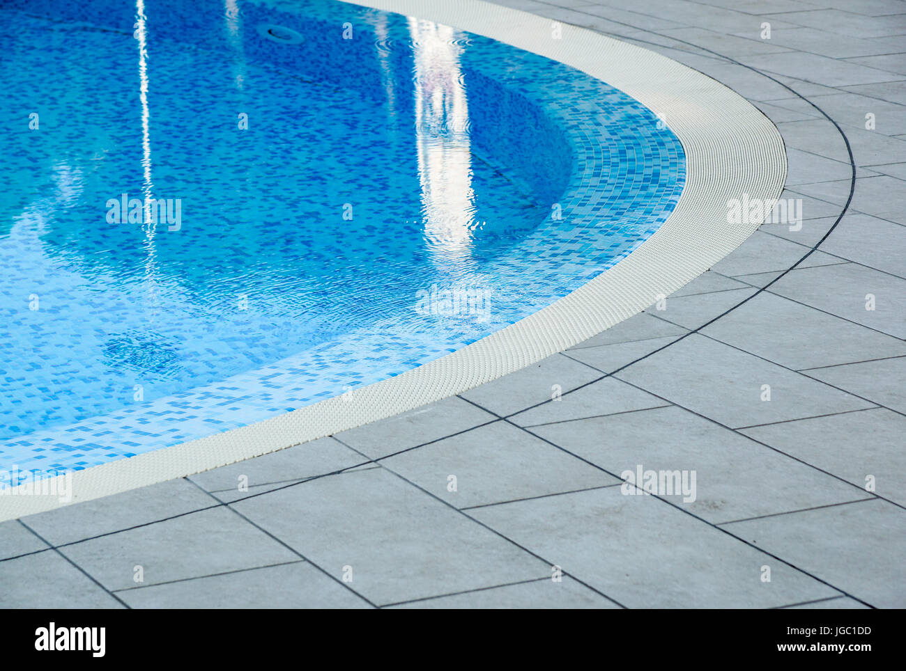 The Sun reflected in the beach water at swimmingpool Stock Photo - Alamy