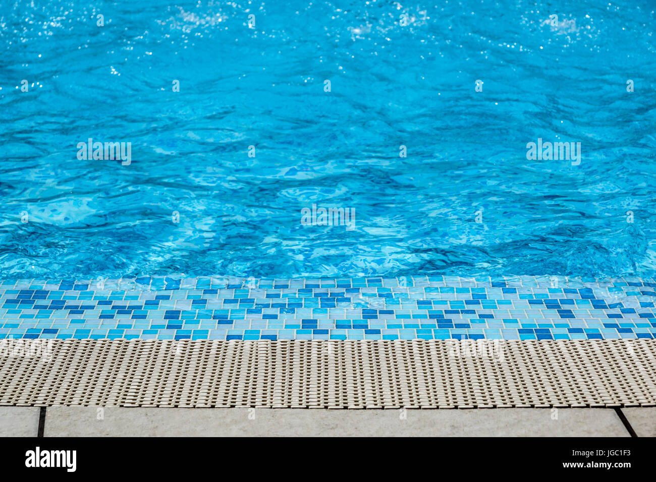 The Sun reflected in the beach water at swimmingpool Stock Photo - Alamy