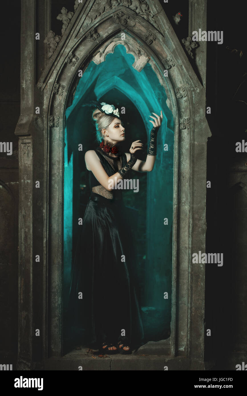 Gothic girl standing in the castle. Old vintage style Stock Photo - Alamy