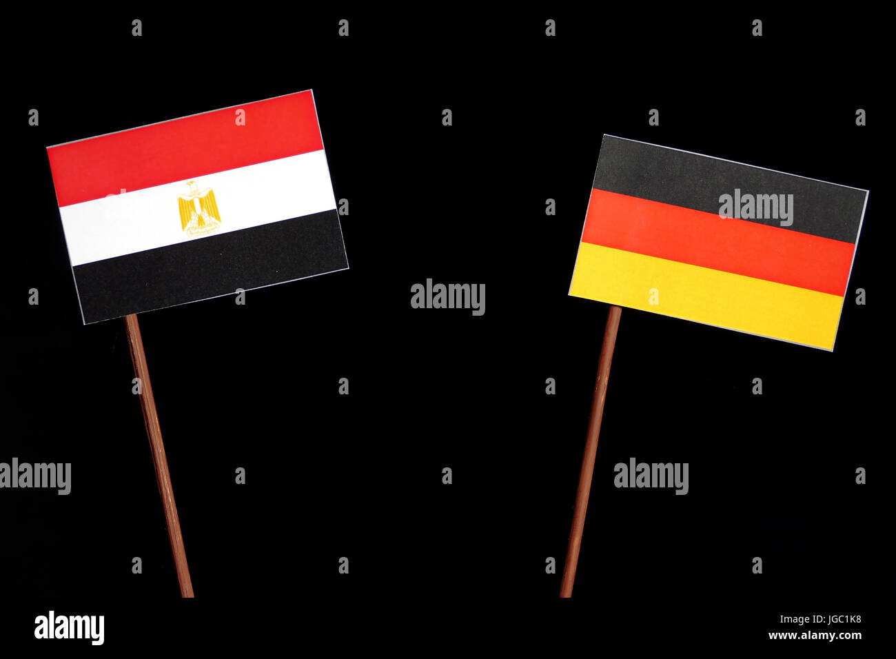 Egyptian flag with German flag isolated on black background Stock Photo ...