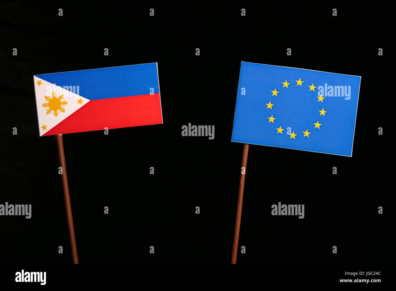 Philippines flag with European Union (EU) flag isolated on black ...