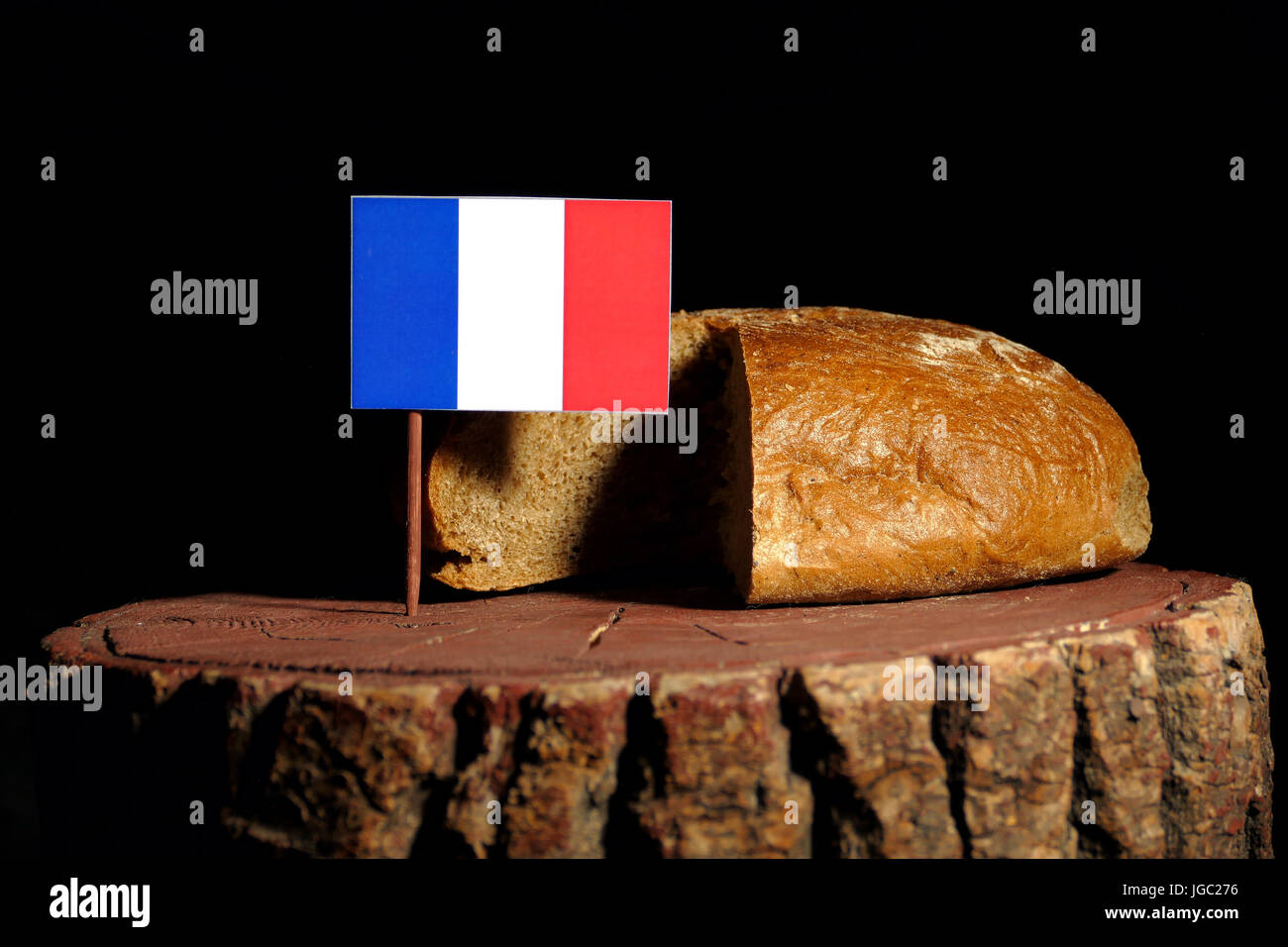 French flag on a stump with bread isolated Stock Photo - Alamy