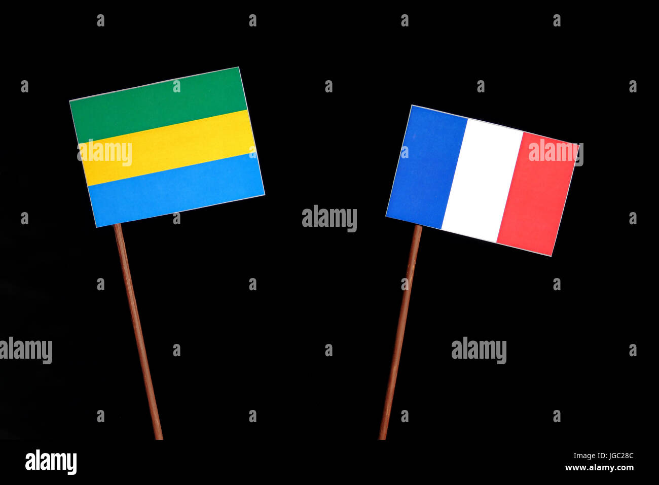 Gabon flag with French flag isolated on black background Stock Photo ...