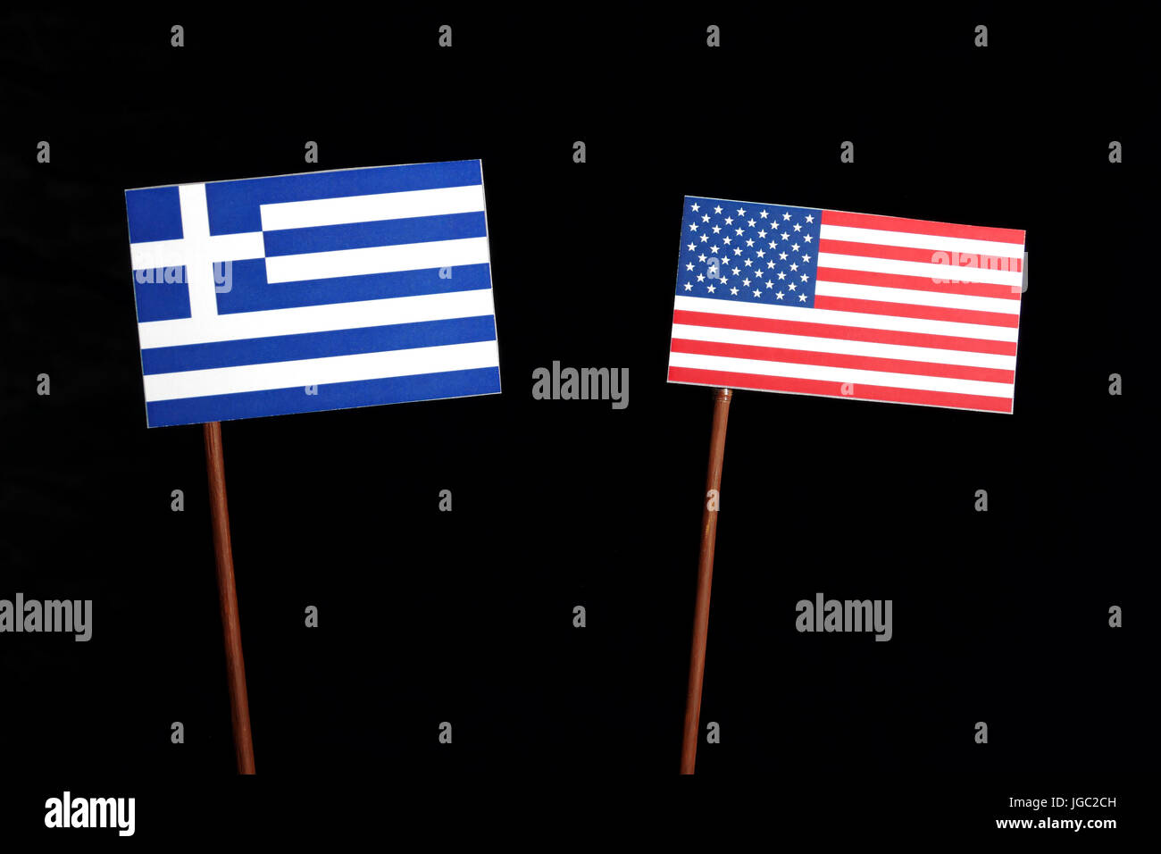 Greek flag with USA flag isolated on black background Stock Photo - Alamy