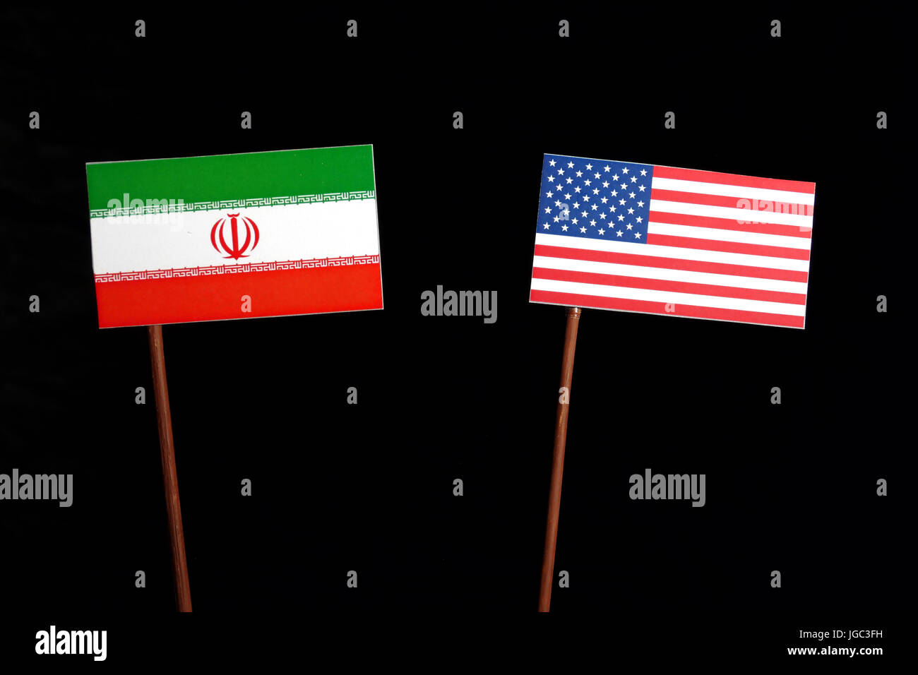 Iranian flag with USA flag isolated on black background Stock Photo - Alamy