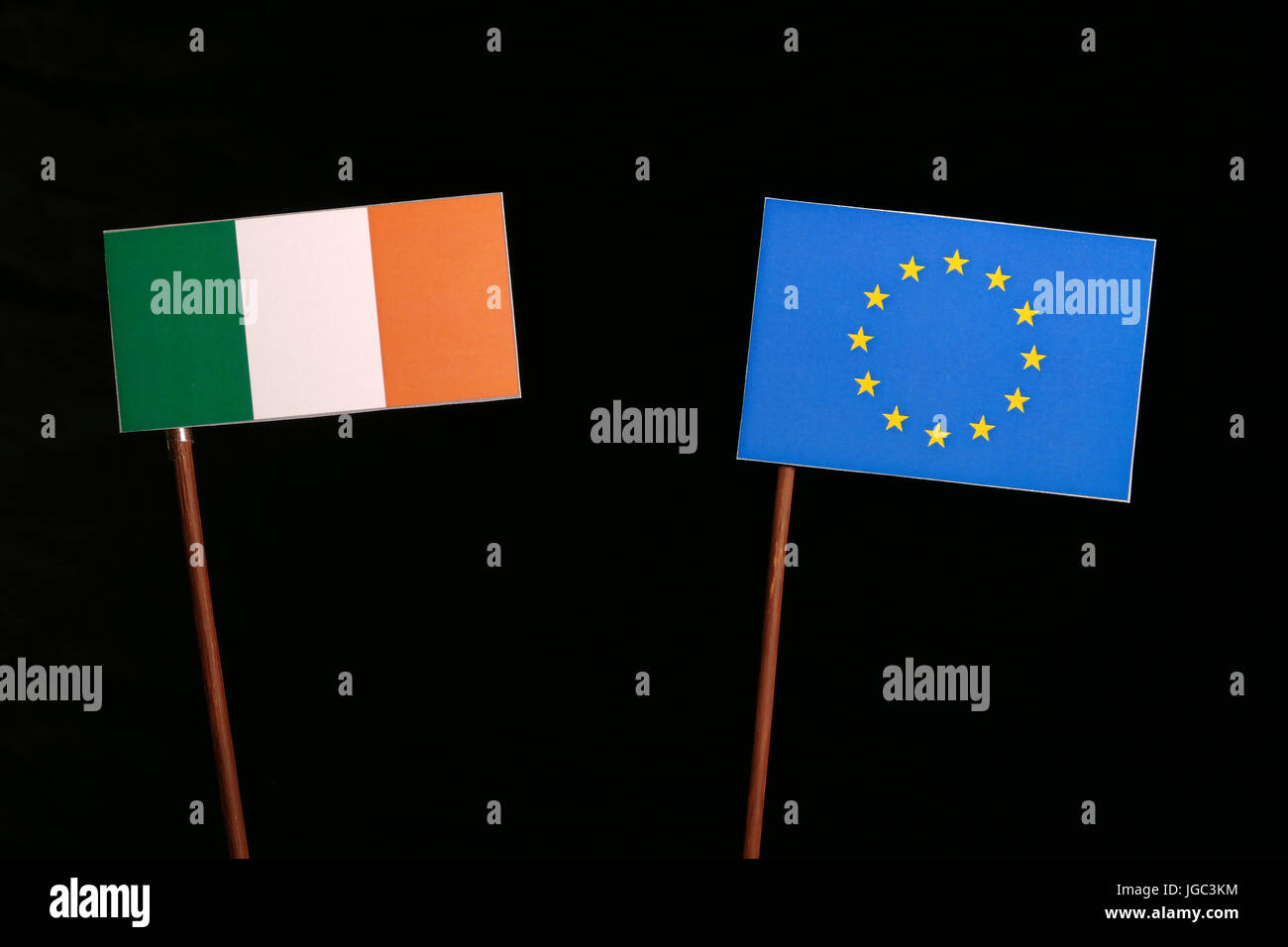 Irish flag with European Union (EU) flag isolated on black background ...