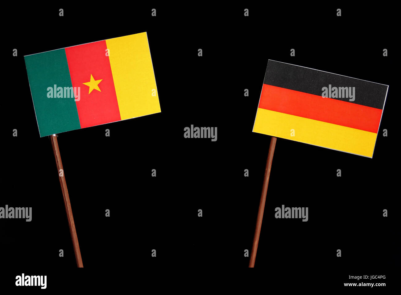 Cameroon flag with German flag isolated on black background Stock Photo ...