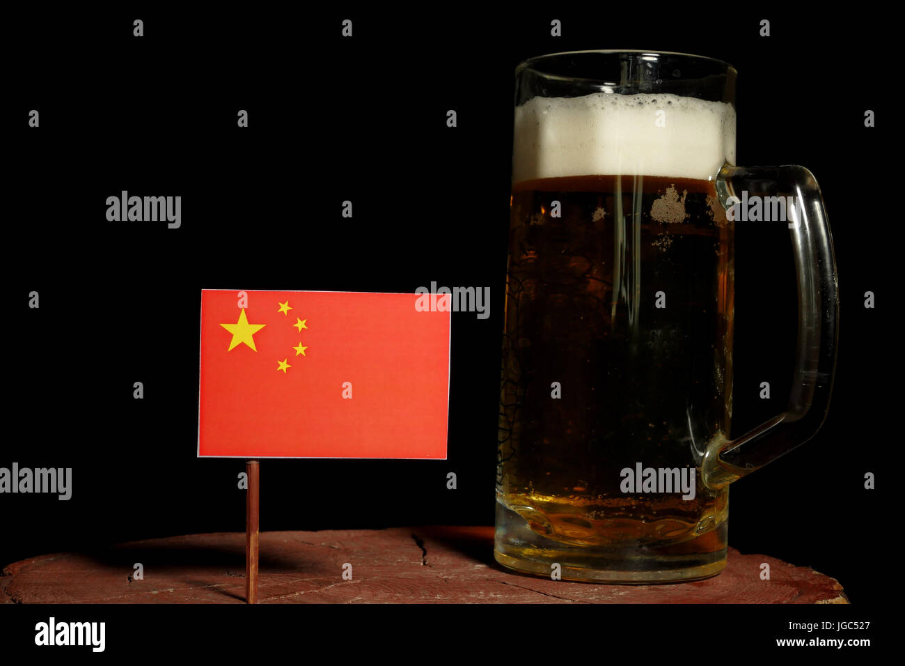 Chinese flag with beer mug isolated on black background Stock Photo - Alamy