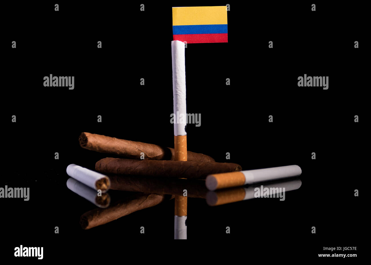 Colombian flag with cigarettes and cigars. Tobacco Industry concept ...
