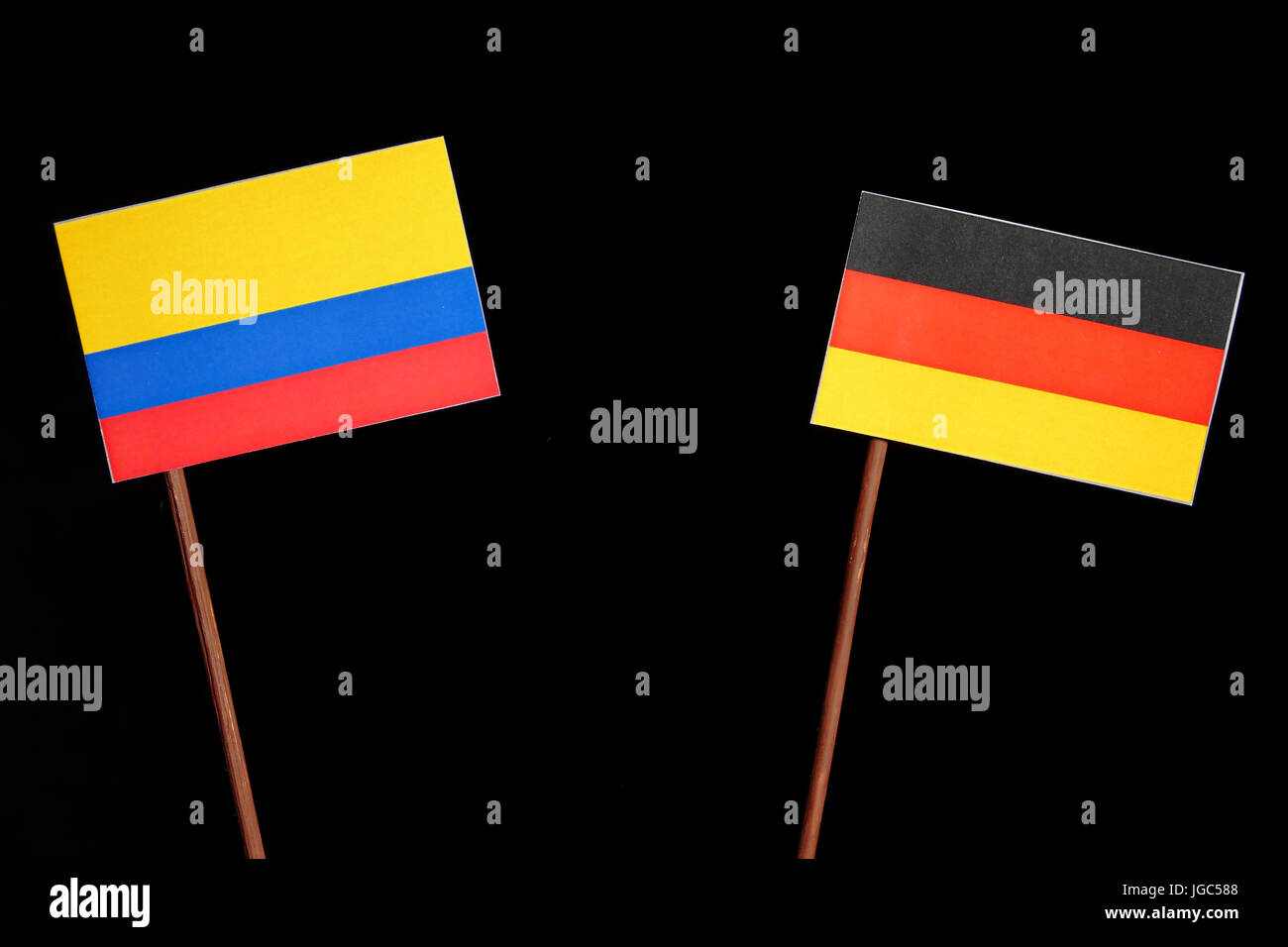 Colombian flag with German flag isolated on black background Stock ...