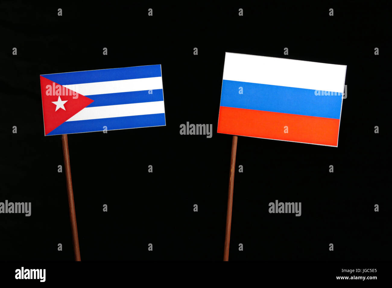 Cuban flag with Russian flag isolated on black background Stock Photo ...