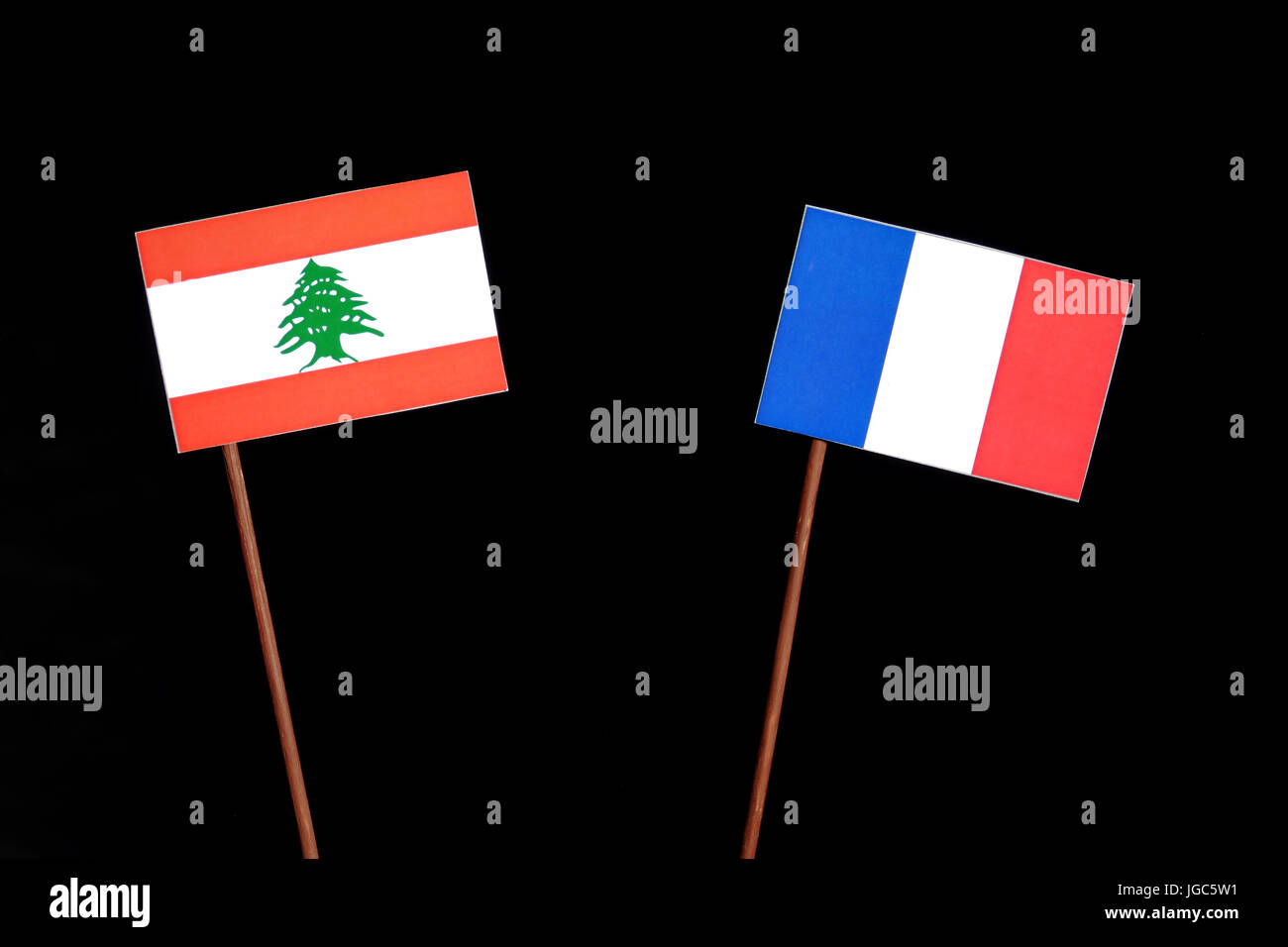 Lebanese flag with French flag isolated on black background Stock Photo ...