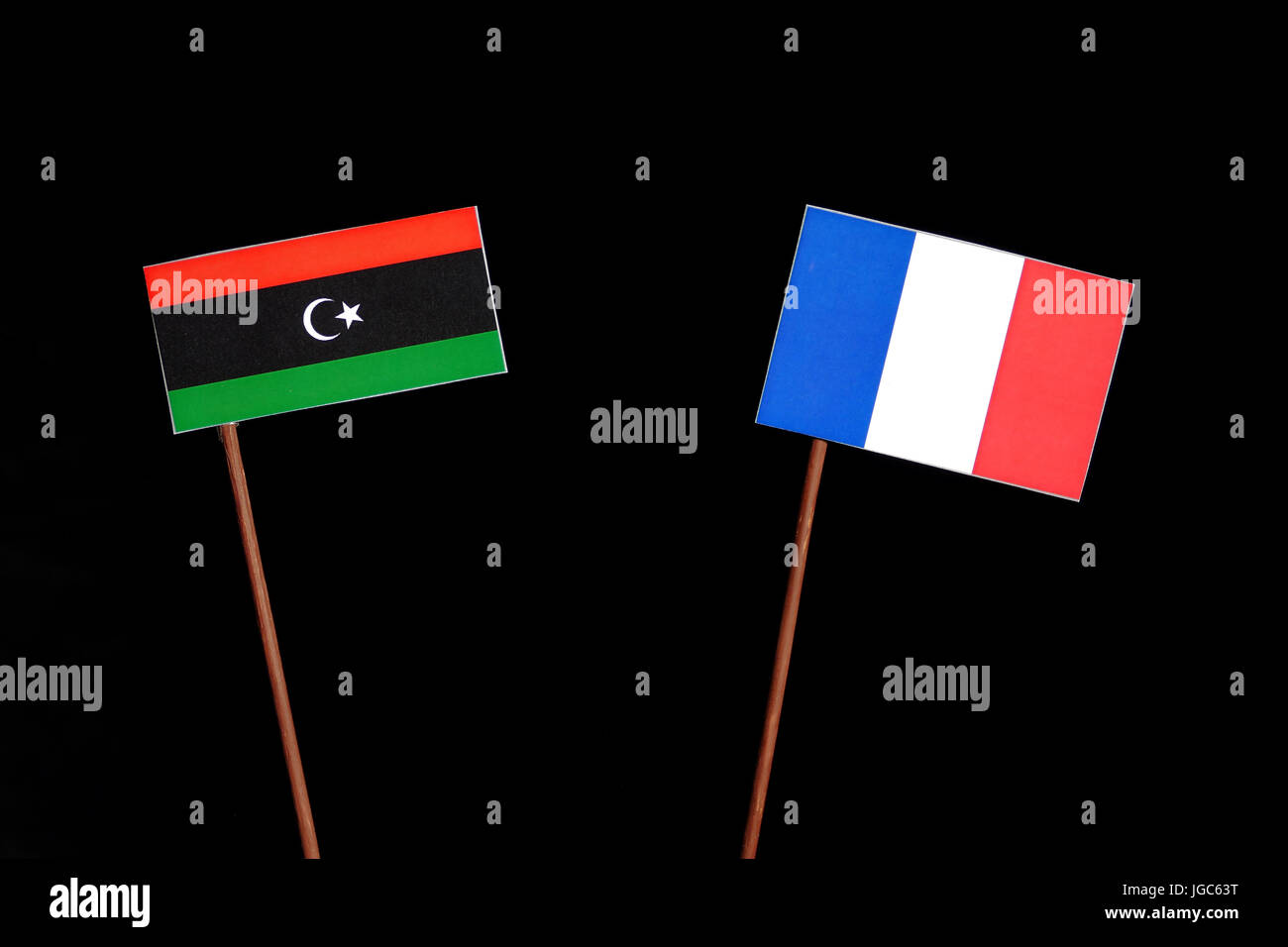 Libyan flag with French flag isolated on black background Stock Photo ...