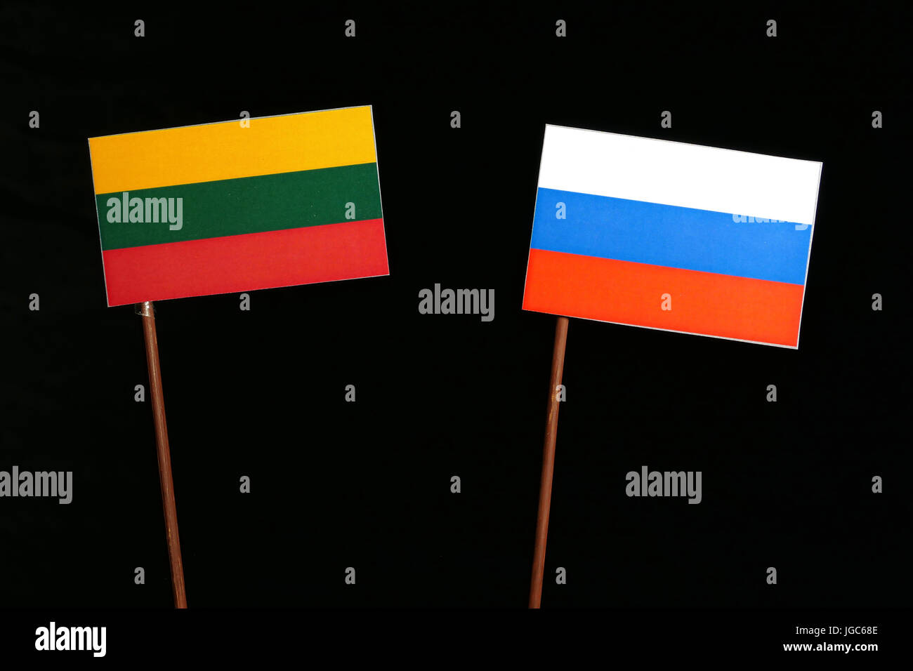 Lithuanian flag with Russian flag isolated on black background Stock ...