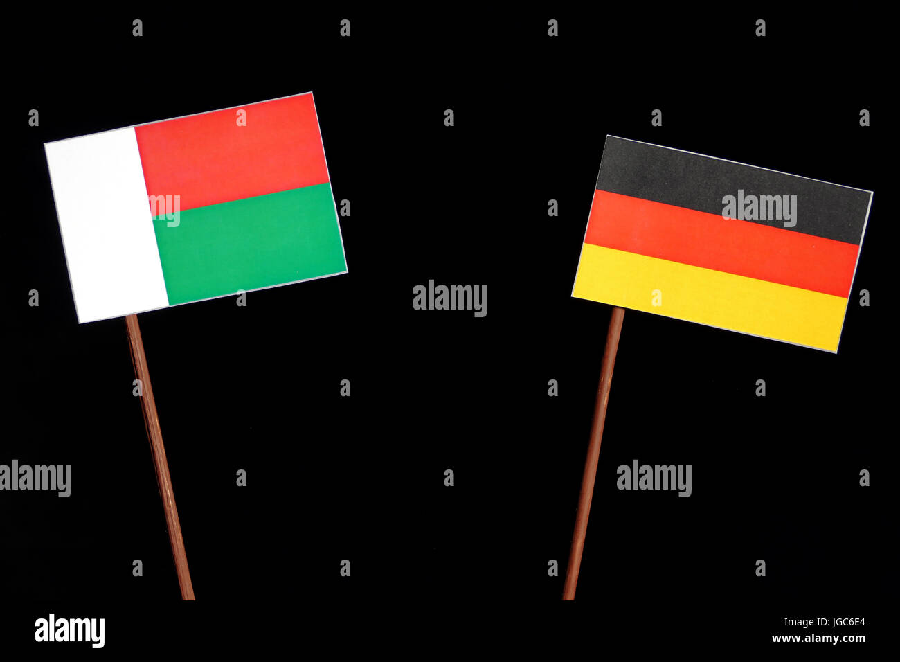Madagascar flag with German flag isolated on black background Stock ...