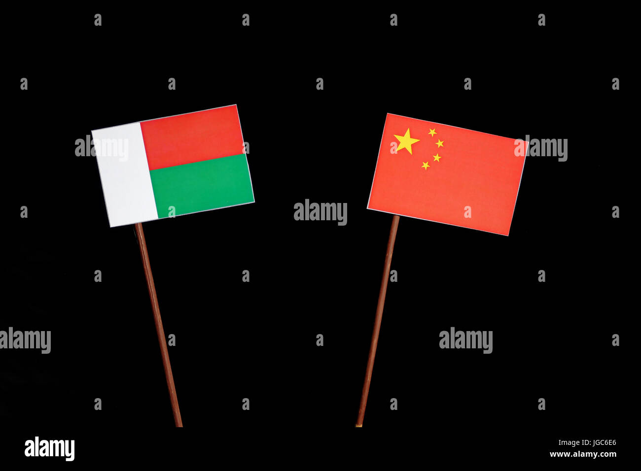 Madagascar flag with Chinese flag isolated on black background Stock ...
