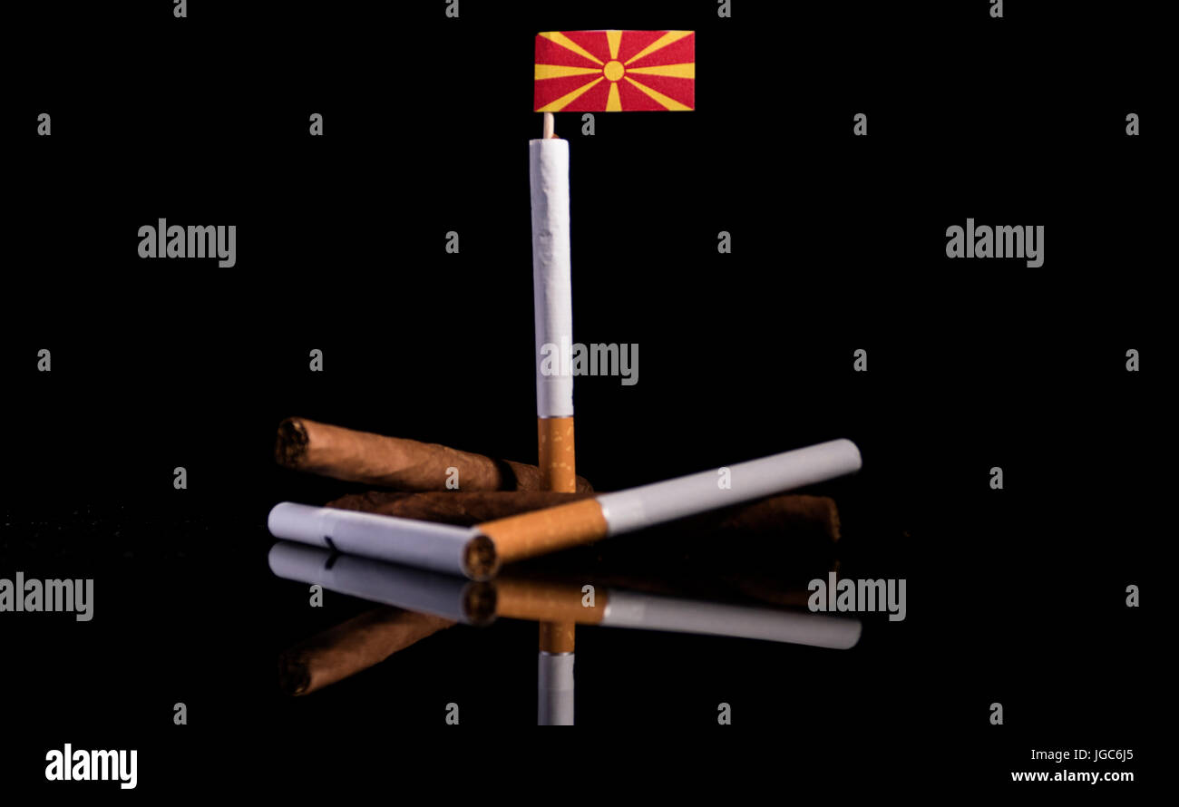 Macedonian flag with cigarettes and cigars. Tobacco Industry concept ...