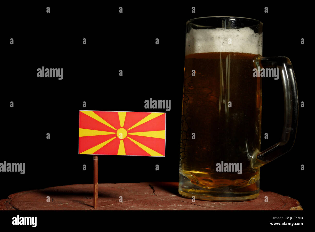 Macedonian flag with beer mug isolated on black background Stock Photo ...