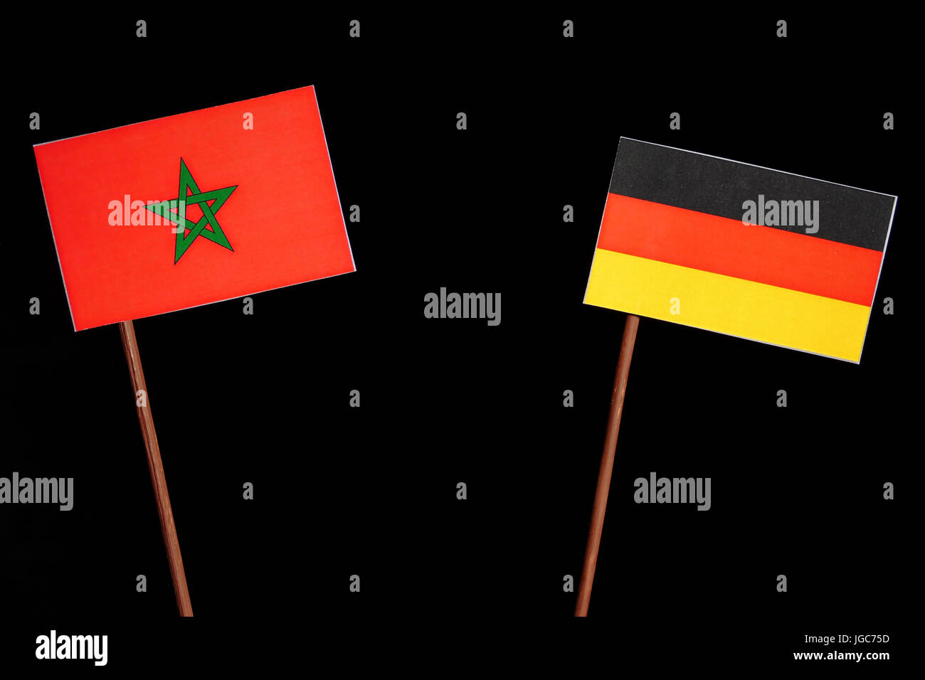 Moroccan flag with German flag isolated on black background Stock Photo ...