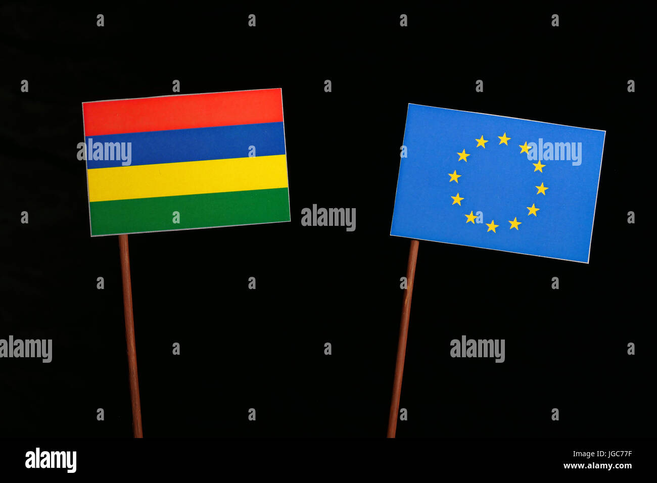 Mauritius flag with European Union (EU) flag isolated on black ...