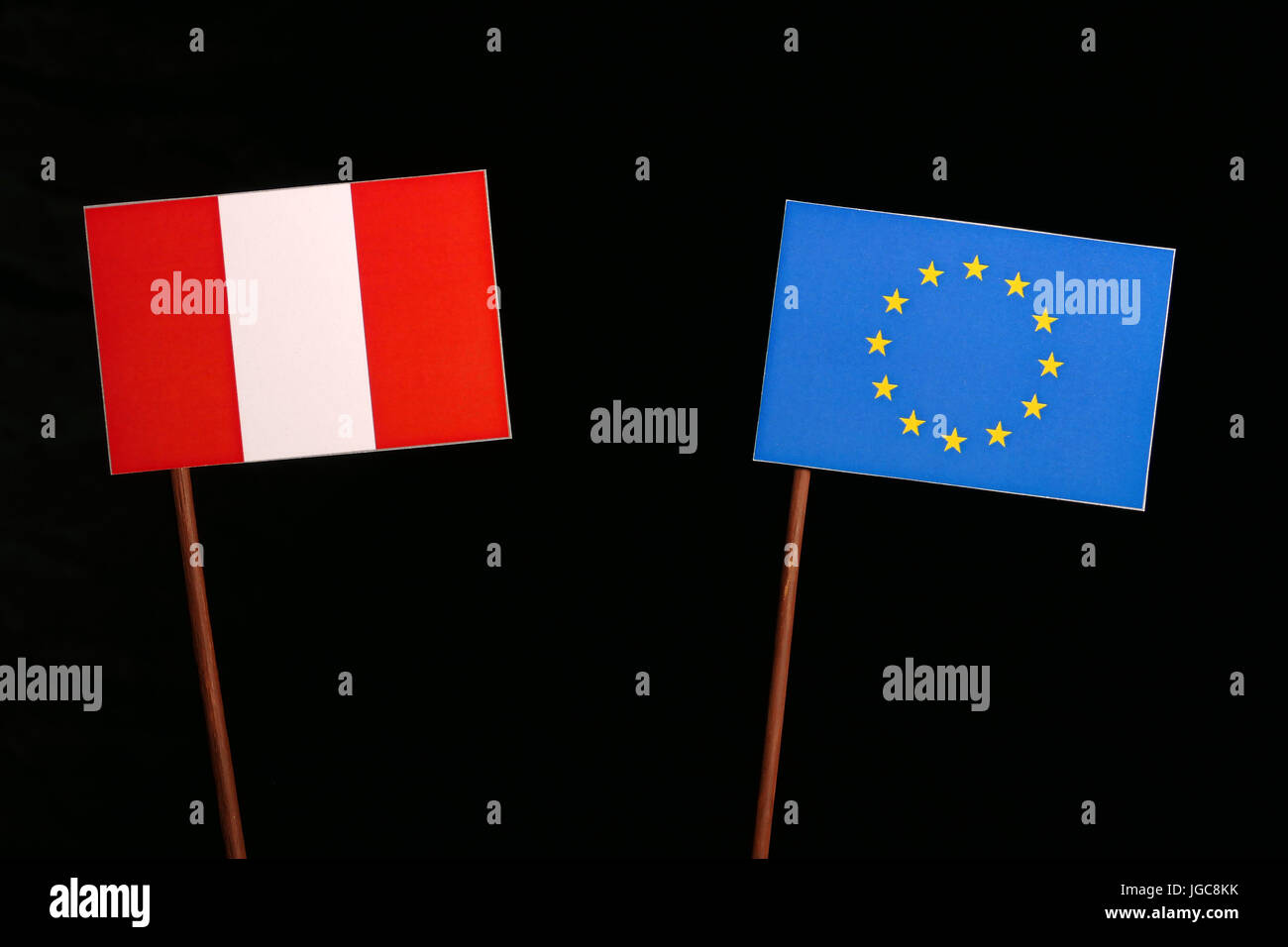 Peruvian flag with European Union (EU) flag isolated on black ...