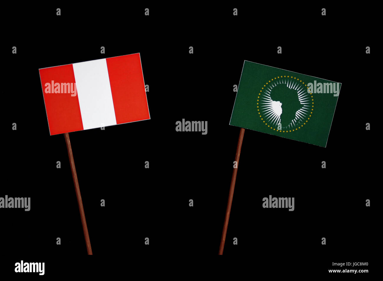 Peruvian flag with African Union flag isolated on black background ...