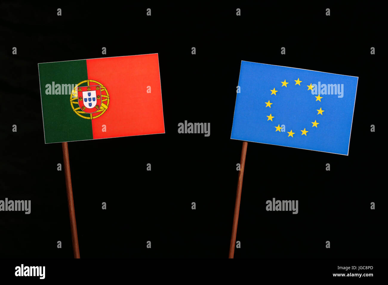 Portuguese flag with European Union (EU) flag isolated on black ...